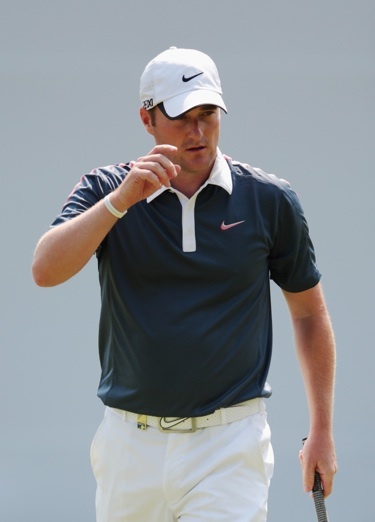 Early leader Warren credits coach Cowen